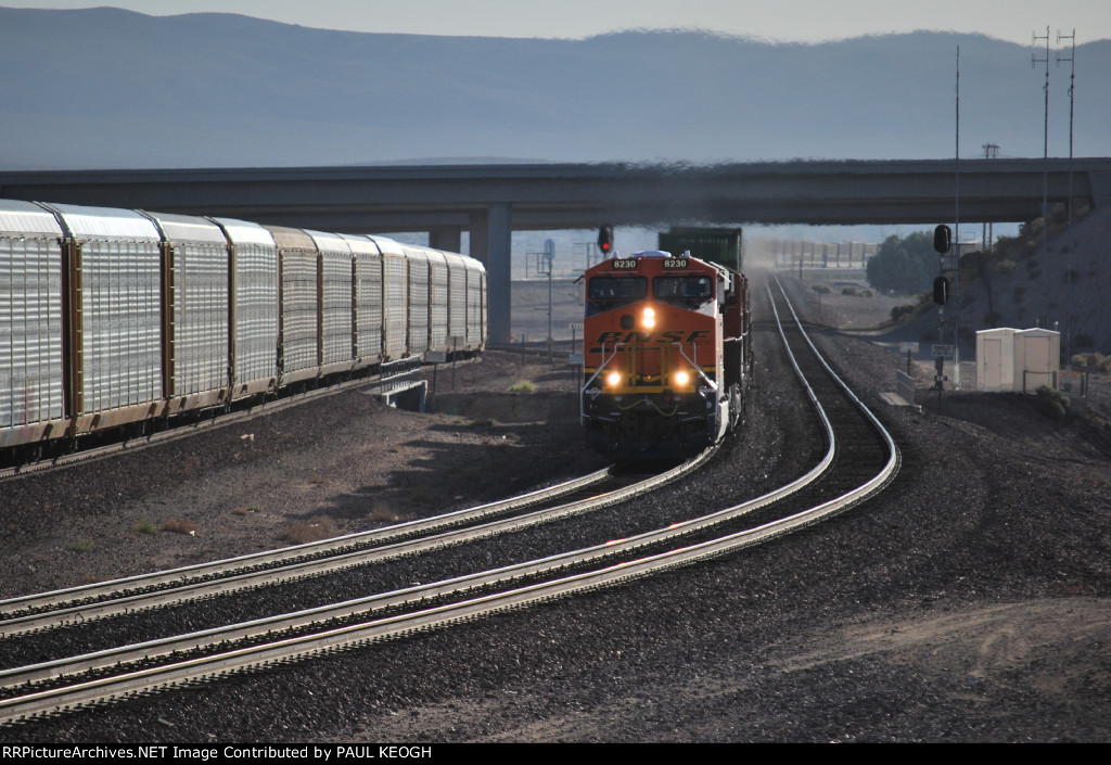 BNSF 8230 Leads a Stack Train westbound as she crosses underneath the California Hwy 58 Bridge ...